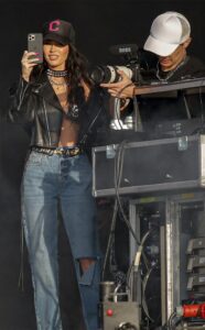 Megan Fox Rocks Sheer Look at Sports Illustrated Event With Machine Gun ...